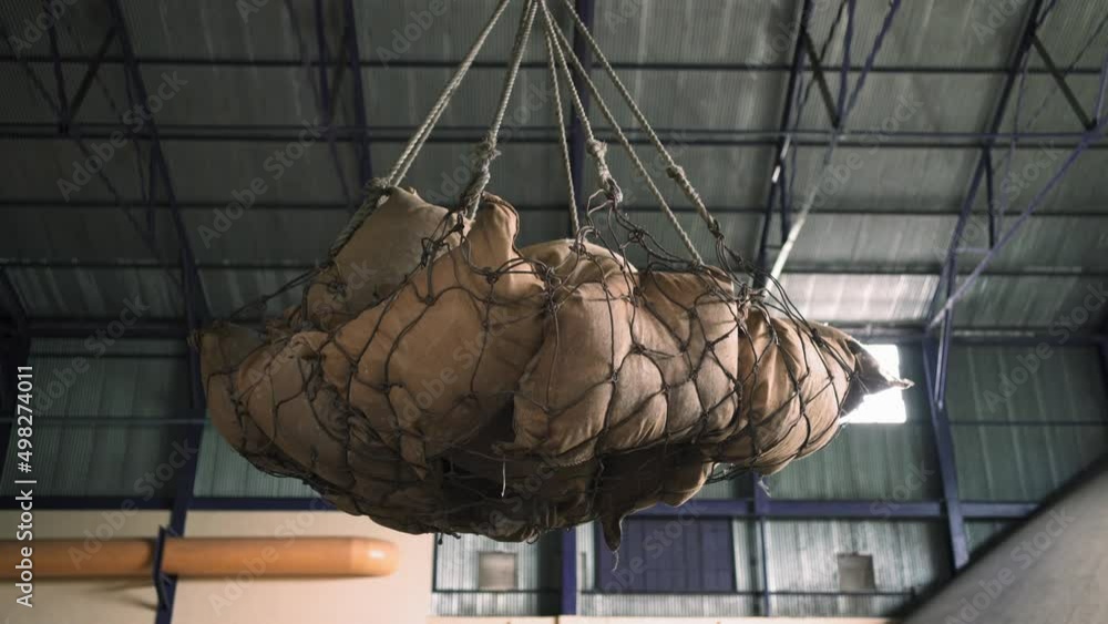 An ancient sugar cane factory in Mauritius, sacks of sugar in made from ...