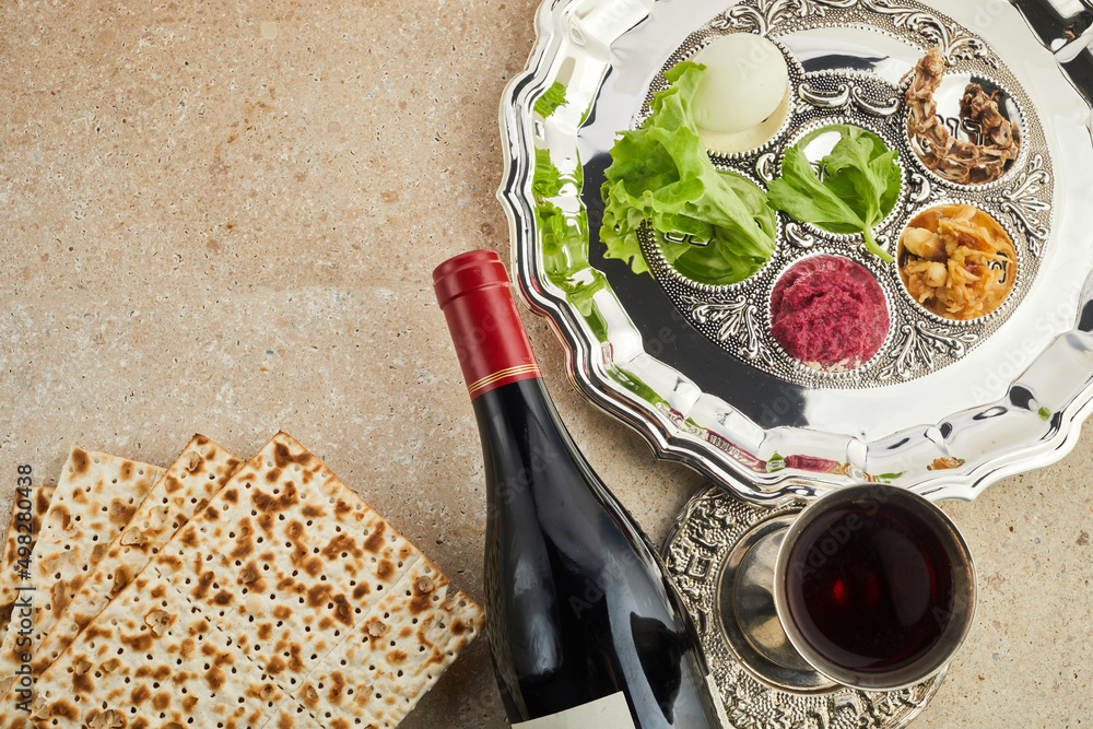 Passover Seder plate with traditional food ontravertine stone ...