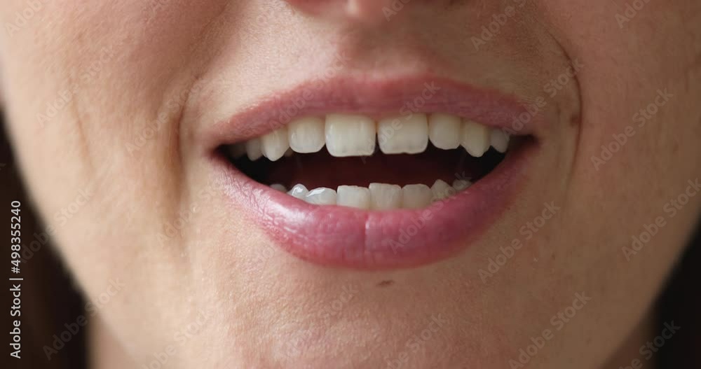 Video „Cropped view lower face part of beautiful young woman, speaking ...