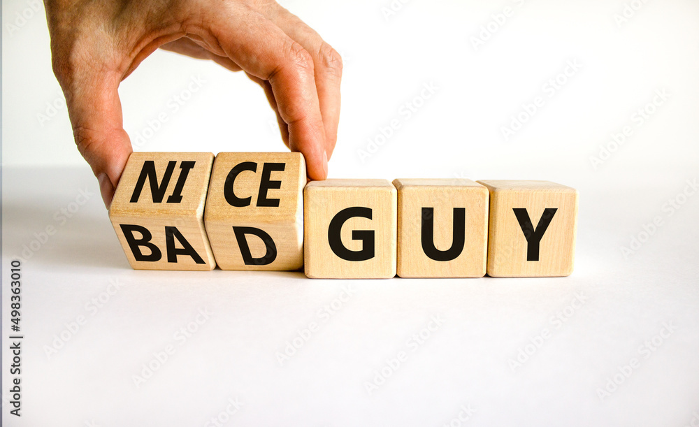 Nice or bad guy symbol. Businessman turns cubes and changes concept ...