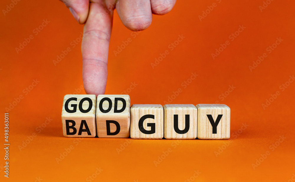 Good or bad guy symbol. Businessman turns cubes and changes concept ...