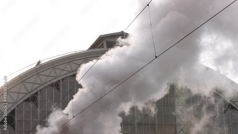 Steam pipe of steam locomotive of railway. Factory pipe of steam ...