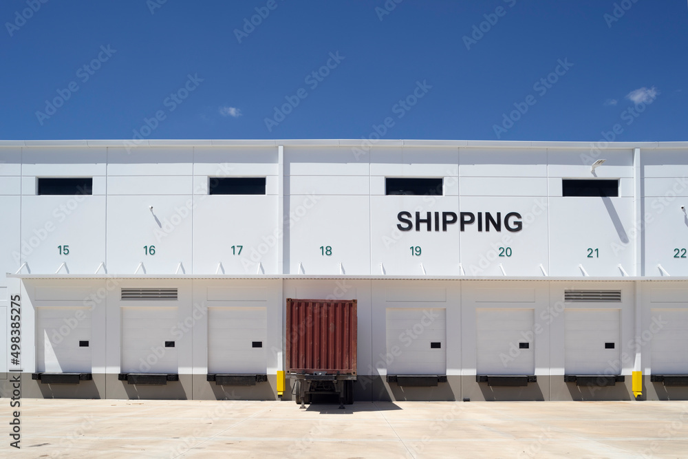 Cargo container parked in a distribution loading dock Stock Photo ...