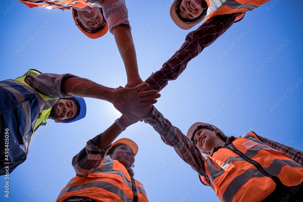 Group of multi-ethnic worker engineers are working together with ...