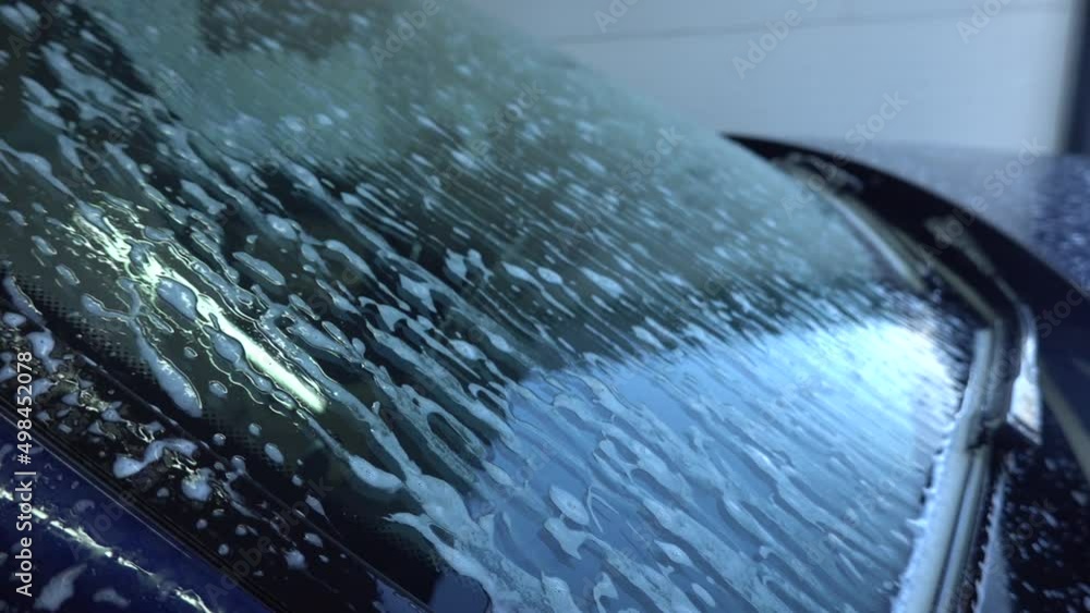 Video Stock 4K Video. Self-service car wash station. Active foam is ...