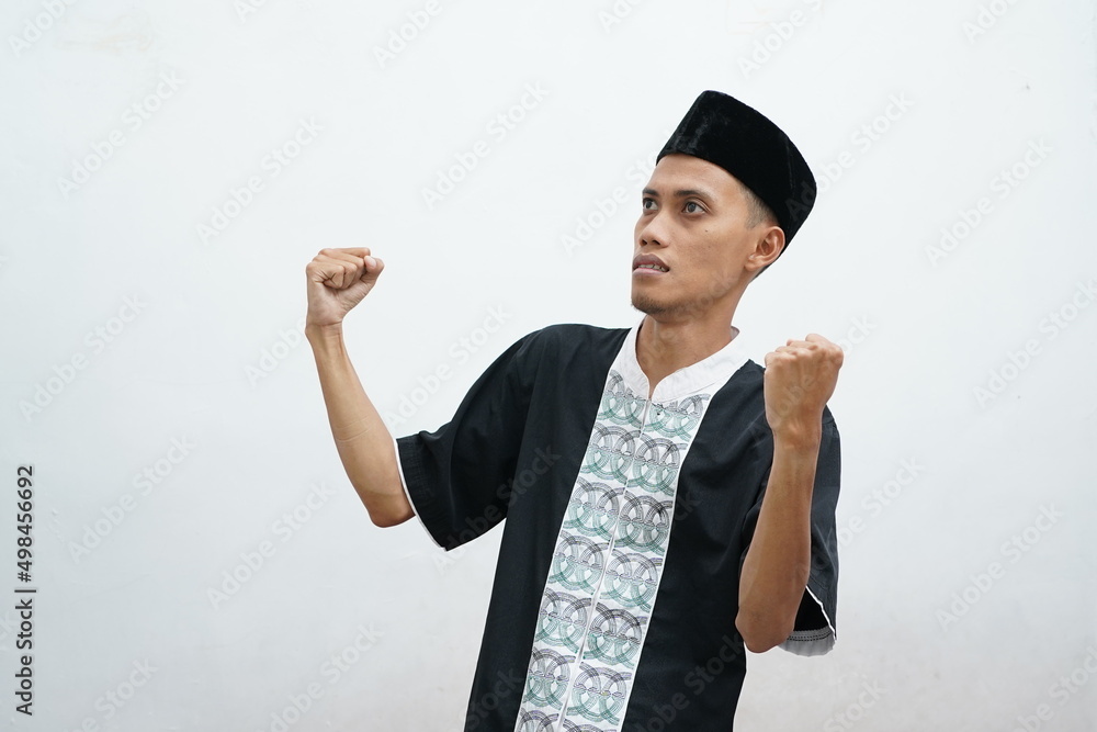 Successful happy muslim man screaming shouting and shows winning ...