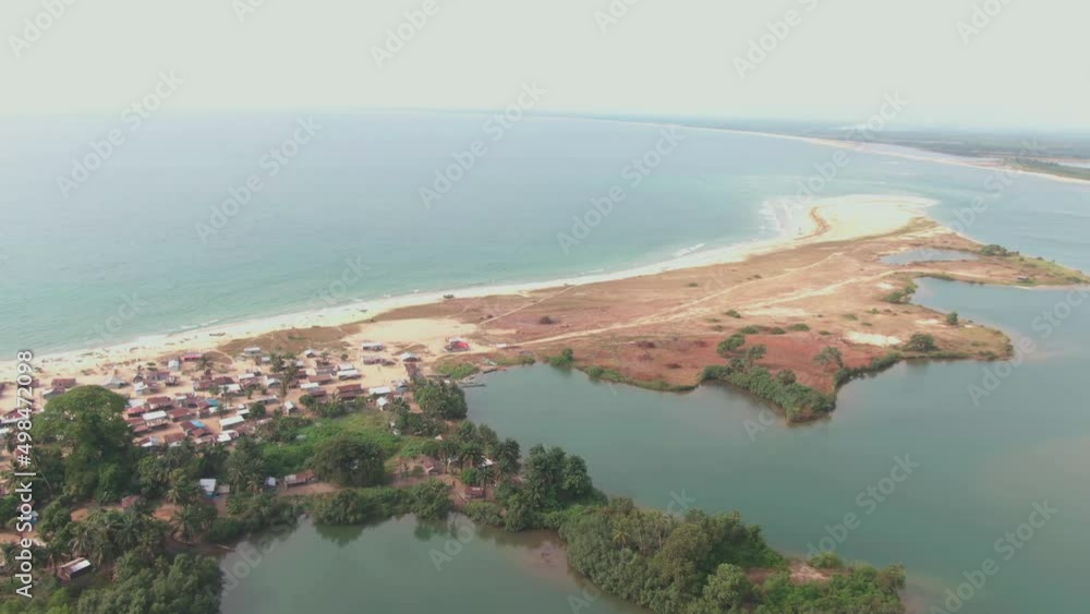 Cape Mount peninsula, a spit of land separating the brackish lagoon ...