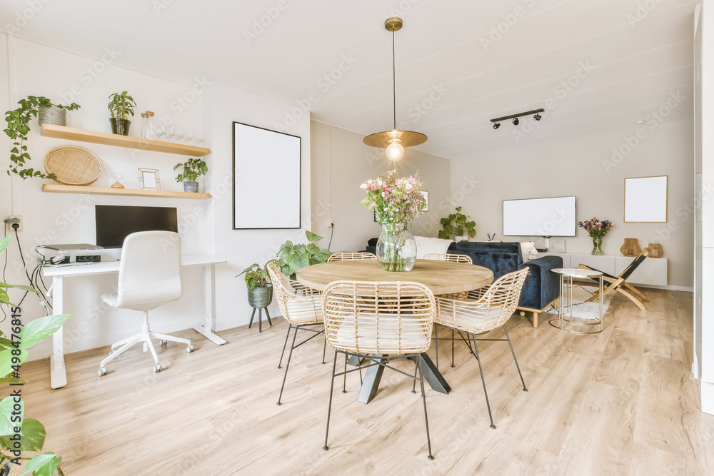 Dining table in kitchen with computer Stock Photo | Adobe Stock