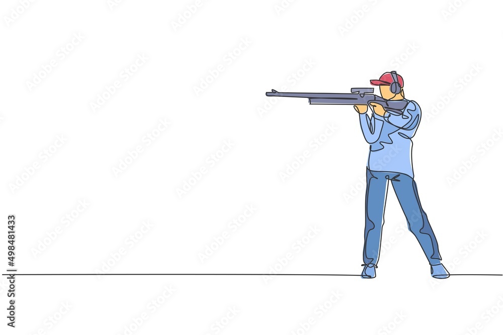 One continuous line drawing young man on shooting training ground ...