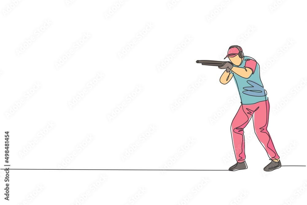 One continuous line drawing of young man on shooting training ground ...