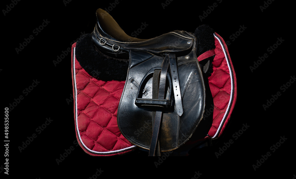 Horse riding saddle on a black background. Leather saddle, red saddle ...