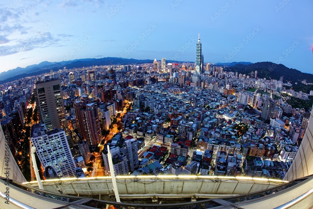 Aerial panorama over Taipei after dark, the capital city of Taiwan ...
