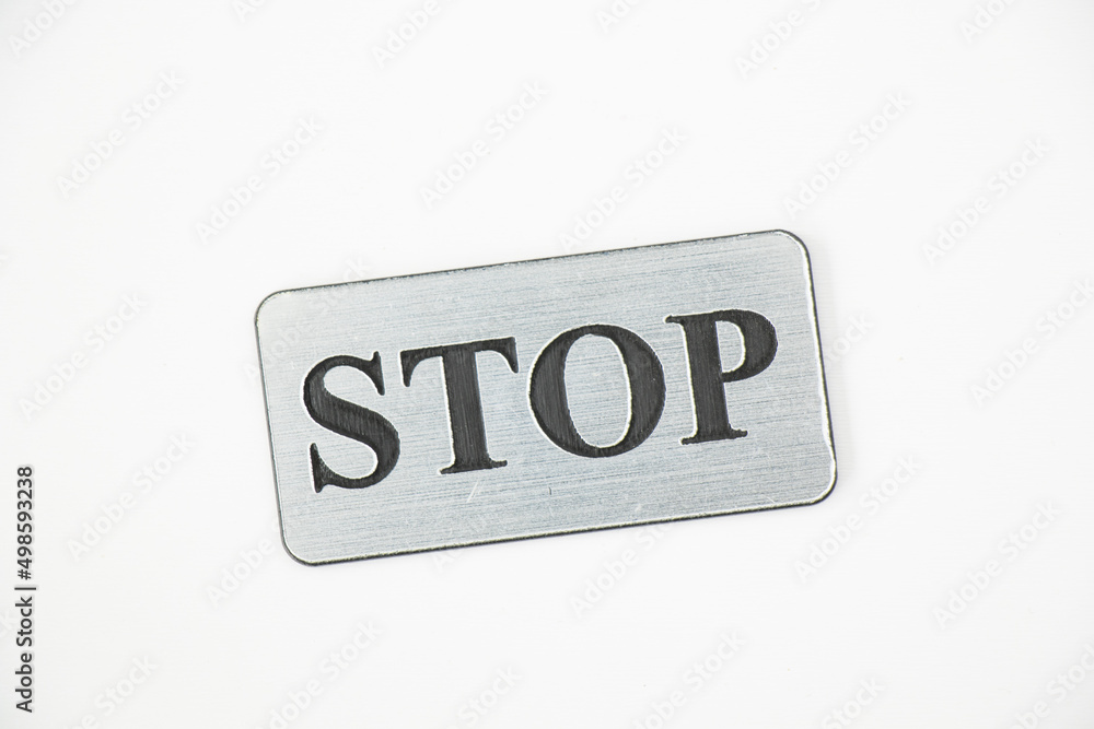 Top view of a black and grey stop sign on the white background Stock ...
