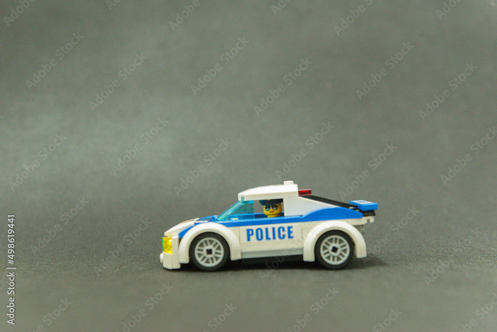 Lego minifigure of police officer driving police car Stock Photo ...