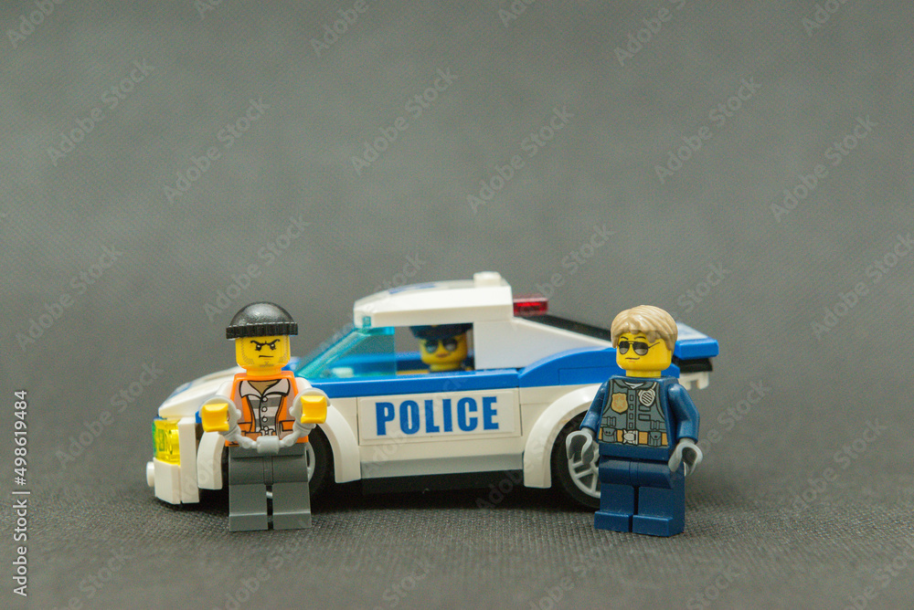 Lego minifigure of police officer driving police car Stock Photo ...