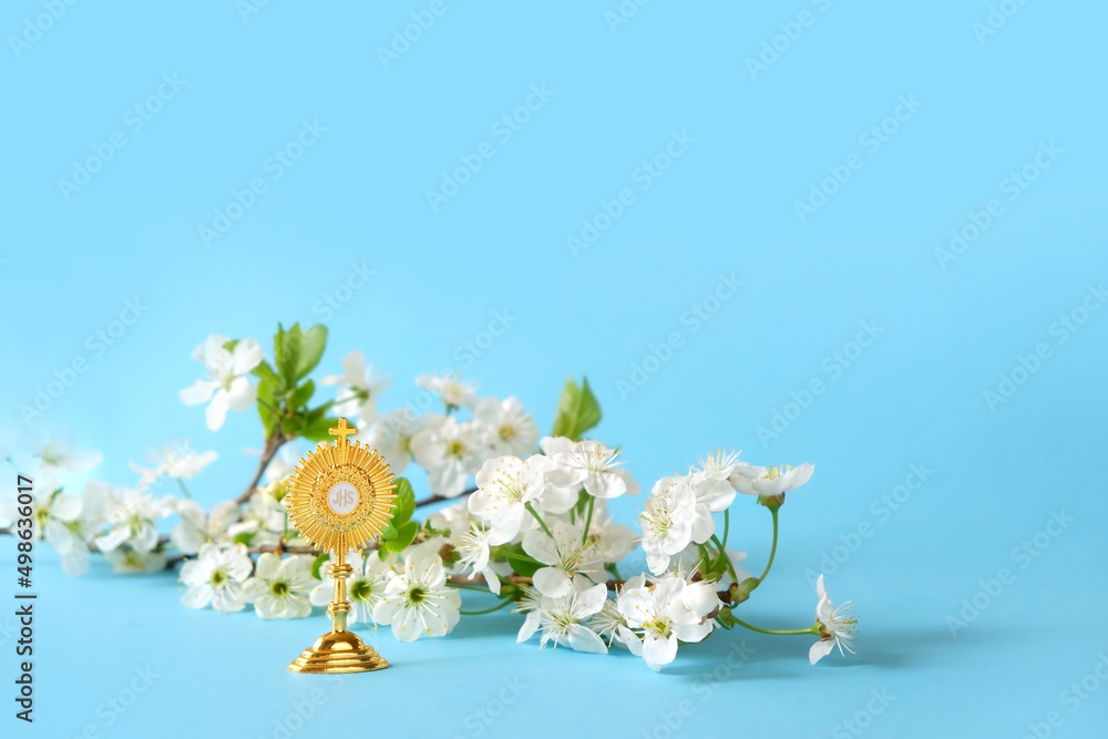 symbol of Catholic Sacrament of Communion and flowers on blue ...