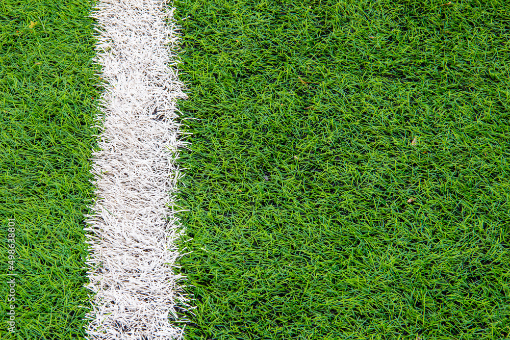 white markings on the artificial turf of a football field, desktop ...