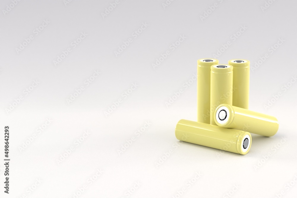 5 yellow cylindrical batteries on a light gray background. Storage ...