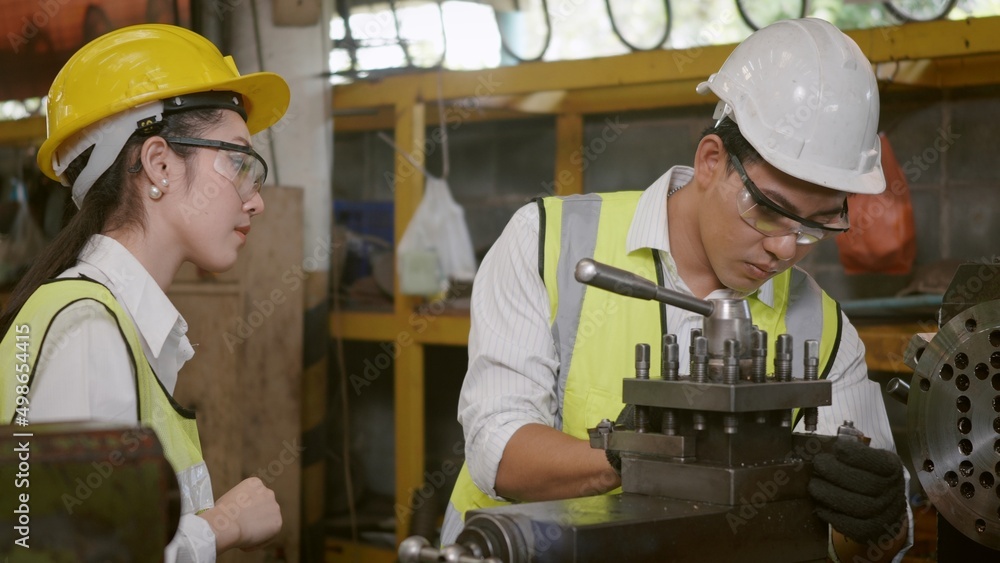 Asian professional mechanical engineer and operation team wearing ...