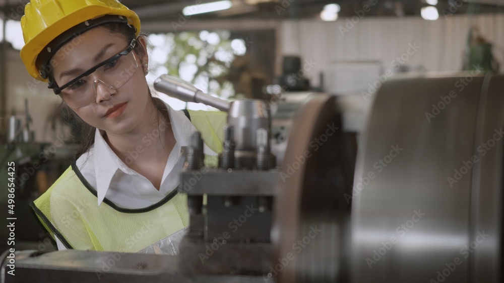 Asian professional mechanical engineer or operation woman wearing ...