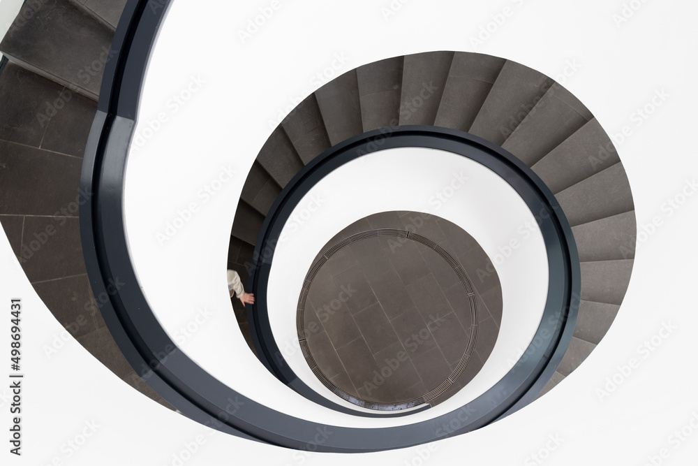 Сircular staircase. Part of a modern minimalist staircase in circular ...