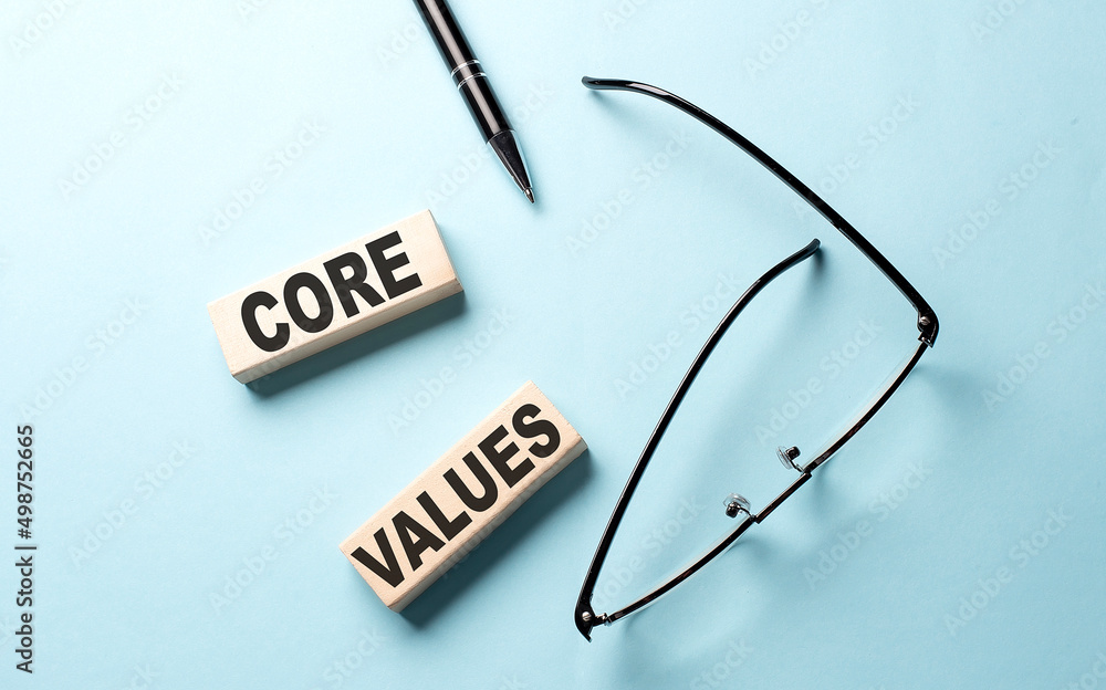 CORE VALUES text on the wooden block ,blue background Stock Photo ...