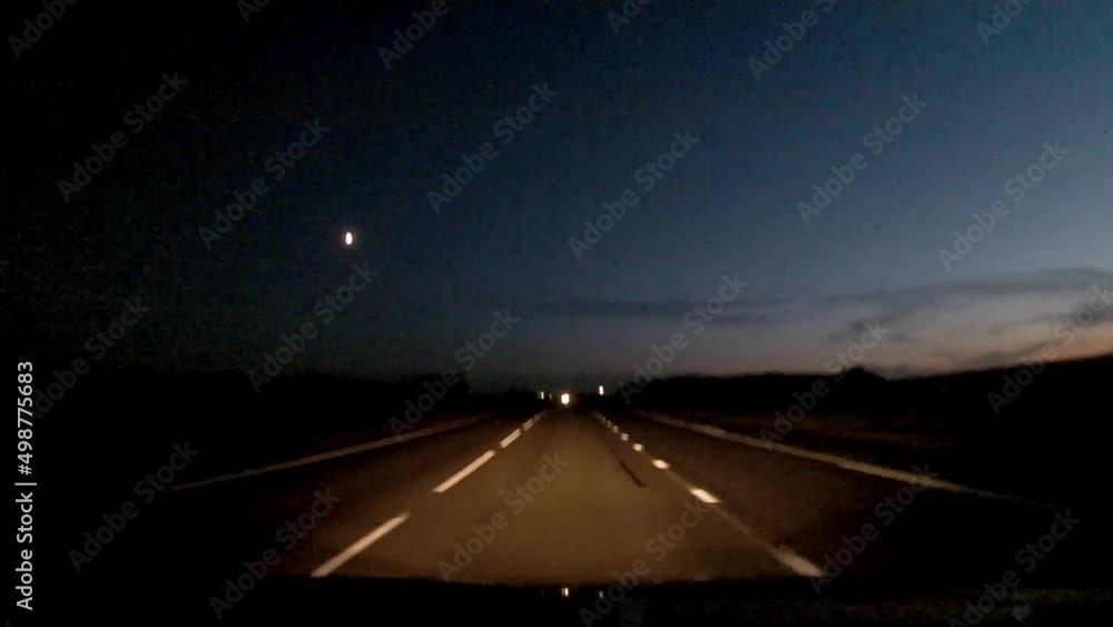 Vidéo Stock Driving a car on a night road with markings, the view from ...