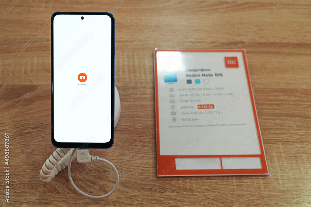 Xiaomi smartphone with Xiaomi Logo on screen is sold at mobile phones ...