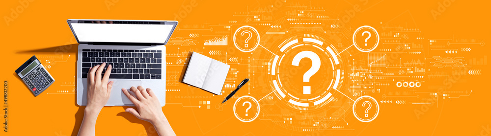 Question marks with person using a laptop computer Stock Photo | Adobe ...