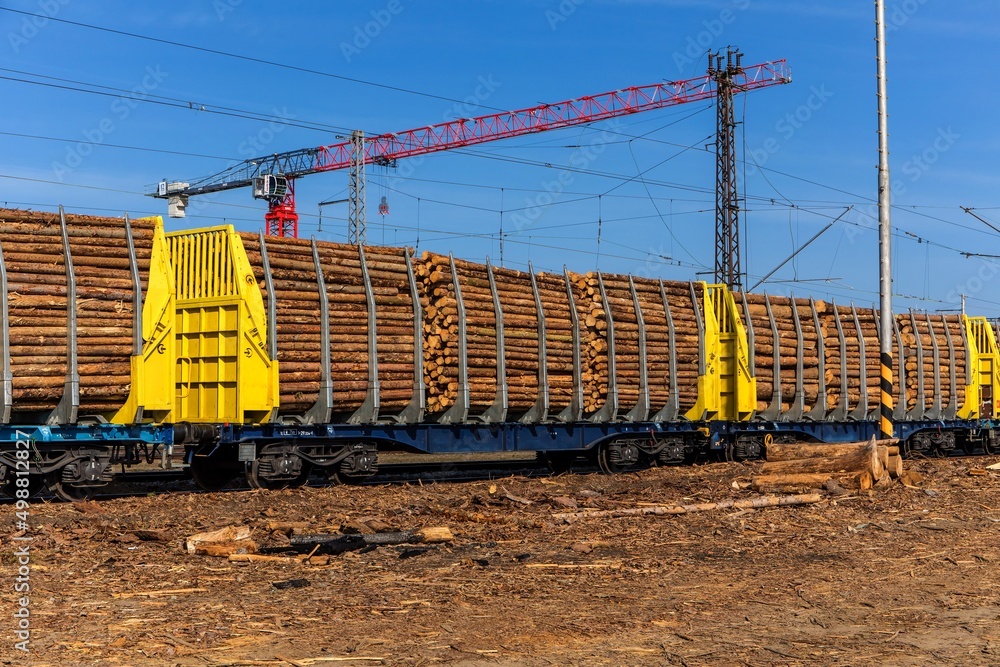 Wagons laden with wood in Czech Republic. Timber trading.Freight wagons ...