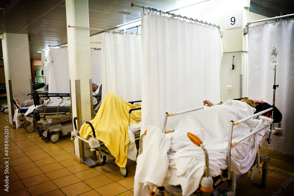 Patients in boxes in the night emergency in a hospital center. Stock ...