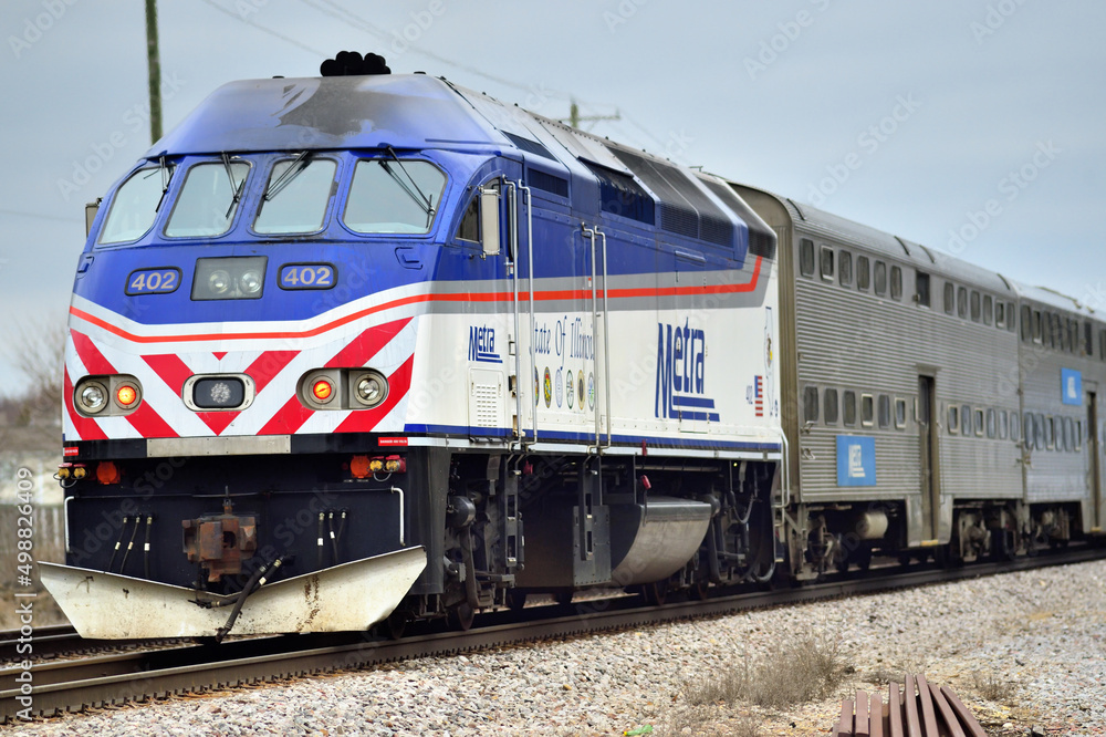 A Metra commuter train passing through the northwest suburbs on its ...
