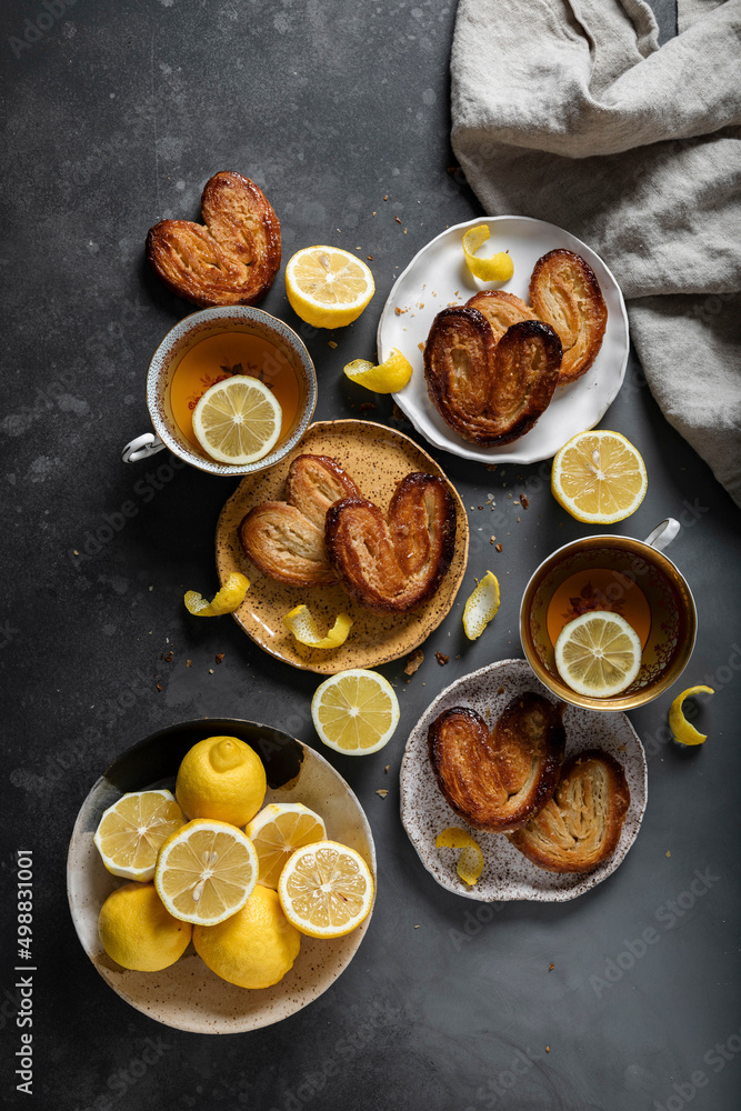 Lemon Palmiers, made from puff pastry on a dark background Stock Photo ...