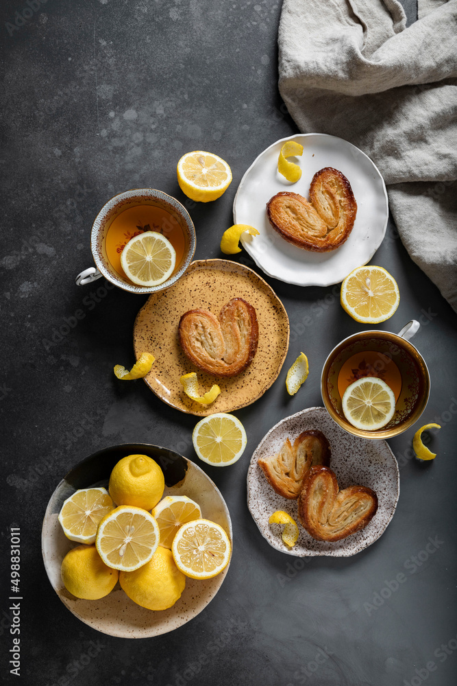 Lemon Palmiers, made from puff pastry on a dark background Stock Photo ...