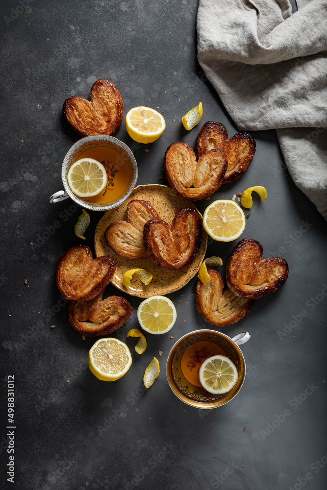 Lemon Palmiers, made from puff pastry on a dark background Stock Photo ...