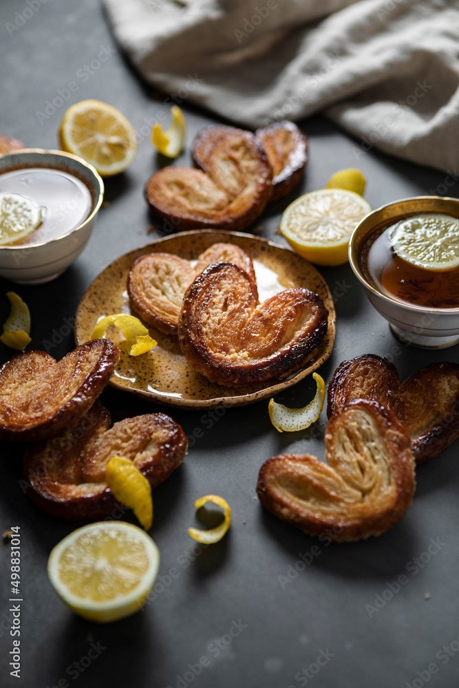 Lemon Palmiers, made from puff pastry on a dark background Stock Photo ...