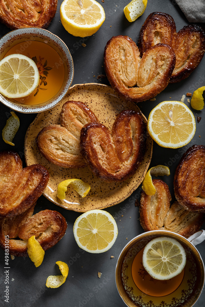 Lemon Palmiers, made from puff pastry on a dark background Stock Photo ...