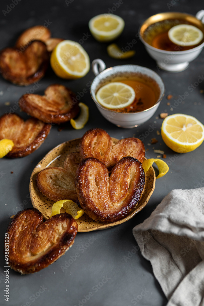 Lemon Palmiers, made from puff pastry on a dark background Stock Photo ...