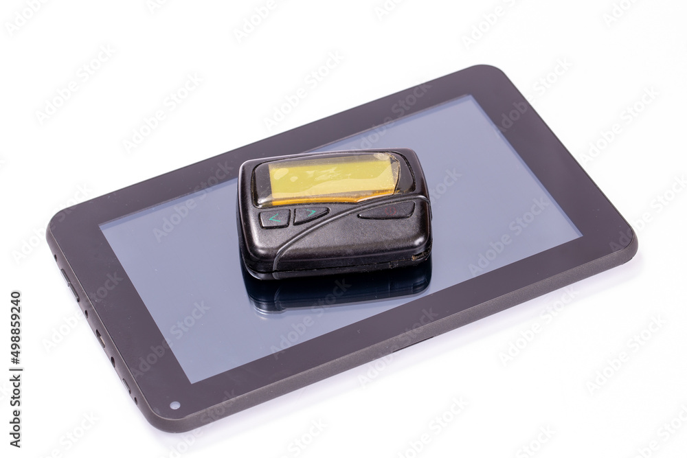 Old pager and new tablet computer on white background Stock Photo ...