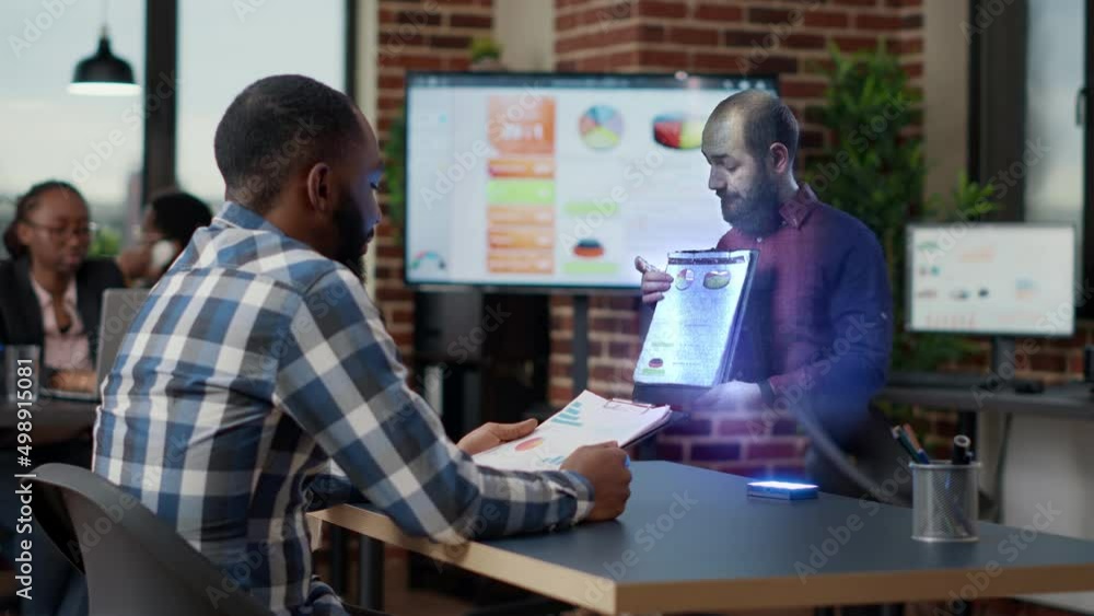 Vídeo do Stock: Team of colleagues talking through holographic video ...
