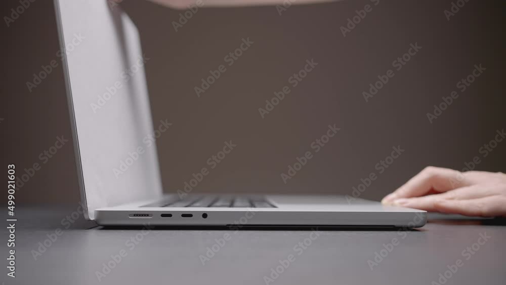 Video Stock The hand opens the laptop. ACTION. A man opens a laptop ...