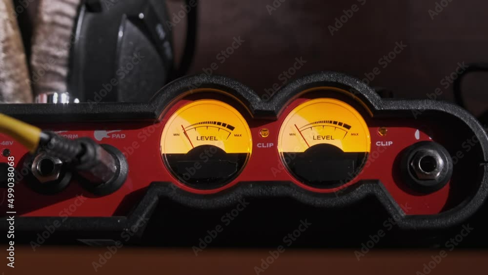 Two Analog Dial Indicators of Sound Signal Level. Arrow moves in sync ...