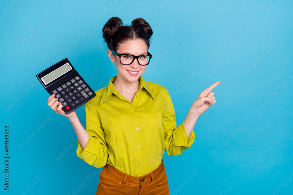 Photo of positive lady hold calculator indicate finger empty space ...