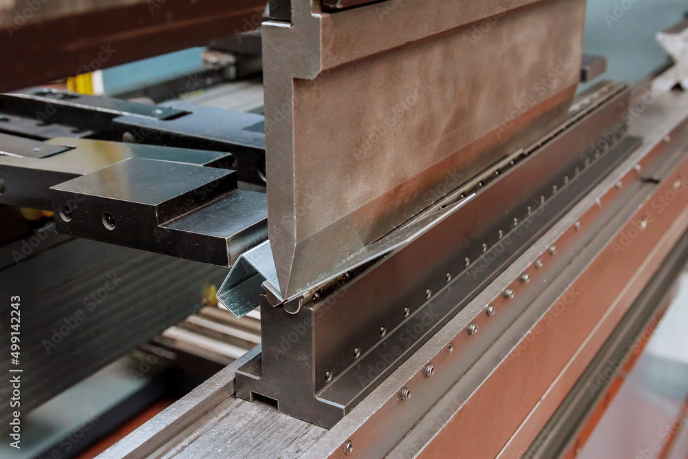 The process of bending galvanized sheet metal 2 millimeters thick on a ...