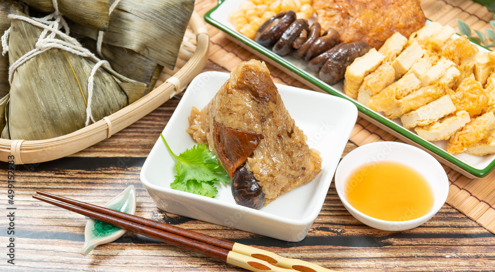 rice dumpling is a traditional Chinese rice dish made of glutinous rice ...
