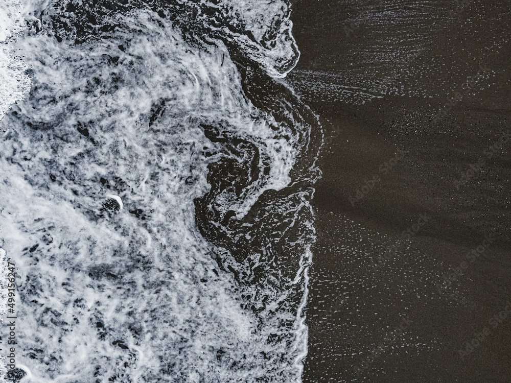 Aerial drone photo of sea beach with wave splash cloudy weather after ...