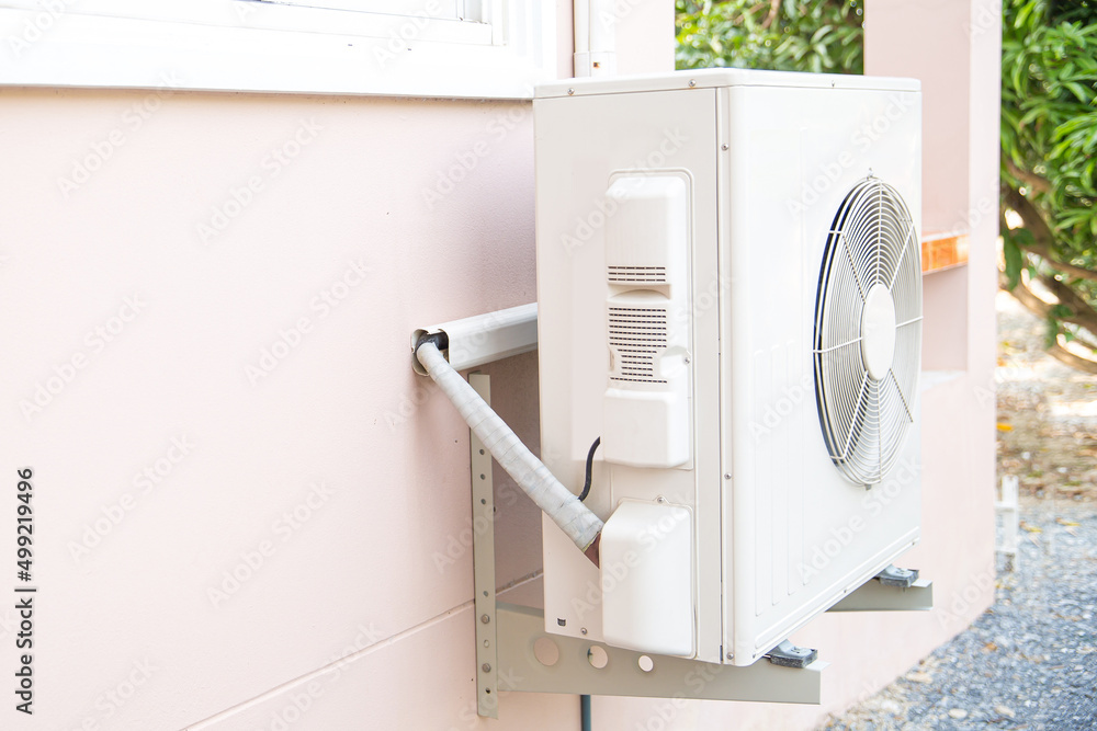 Air compressor, Close-up external split wall type of outdoor home air ...