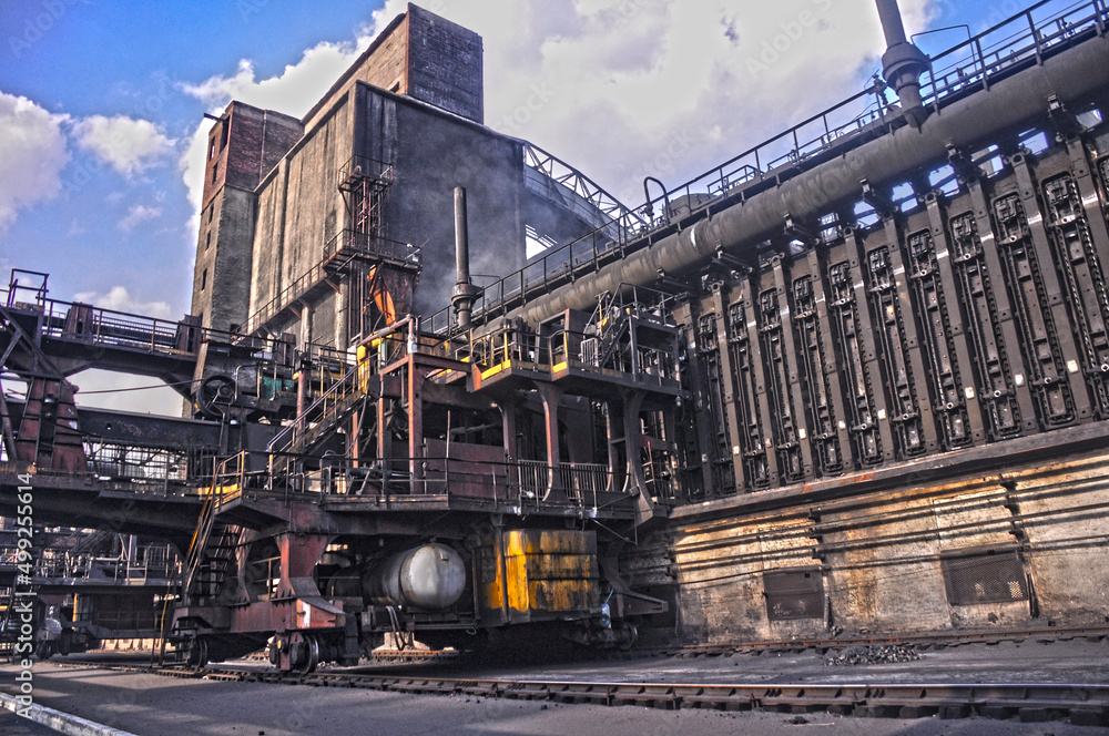 the coke pusher pushes the coke. Coke oven battery. coke and chemicals ...