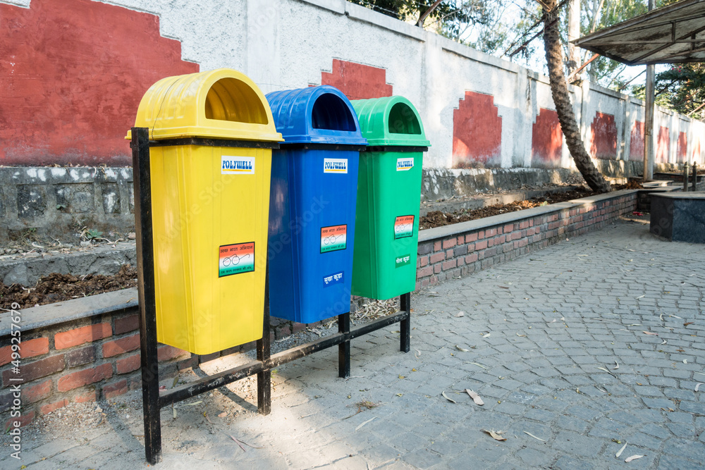 dehradun uttarakhand India. A shot of garbage containers on a road side ...