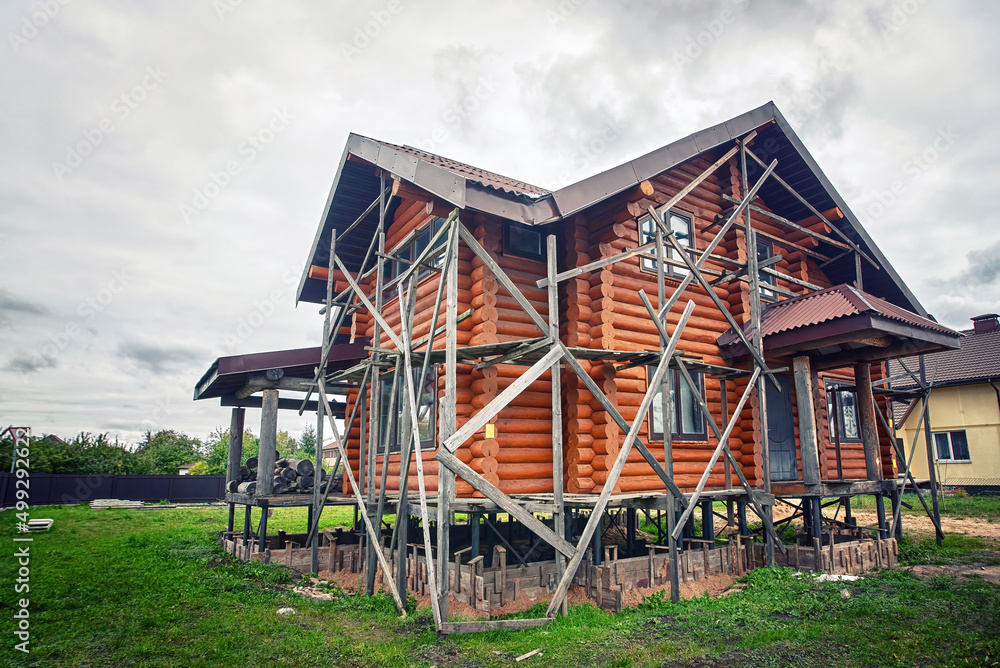 Wooden house architecture. House built from logs. Wooden log house. Log ...
